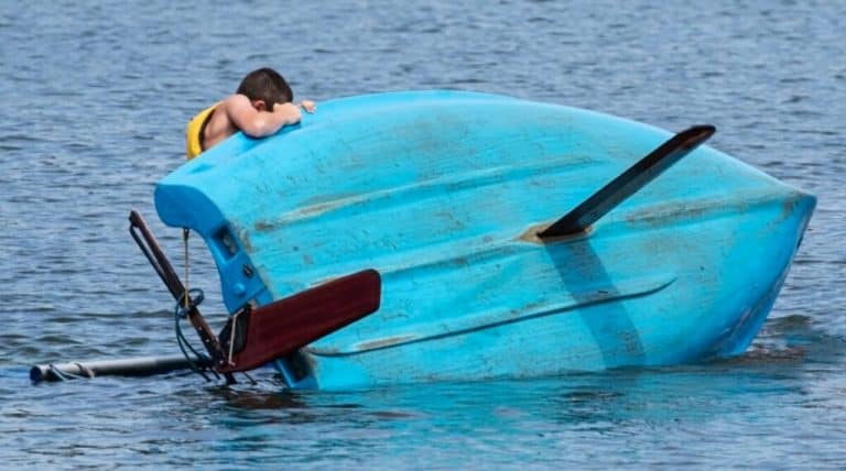 Your Boat Capsizes But Remains Afloat What Should You Do? - Project Boating